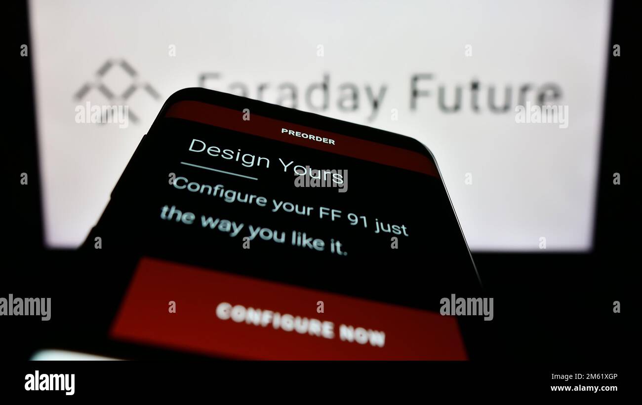 Smartphone with website of electric vehicle company Faraday Future Inc ...