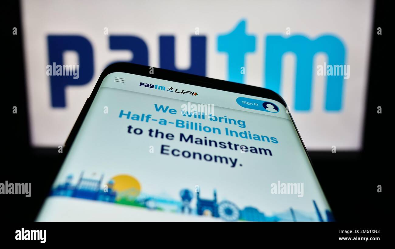 Mobile phone with website of Indian digital payments company Paytm on ...