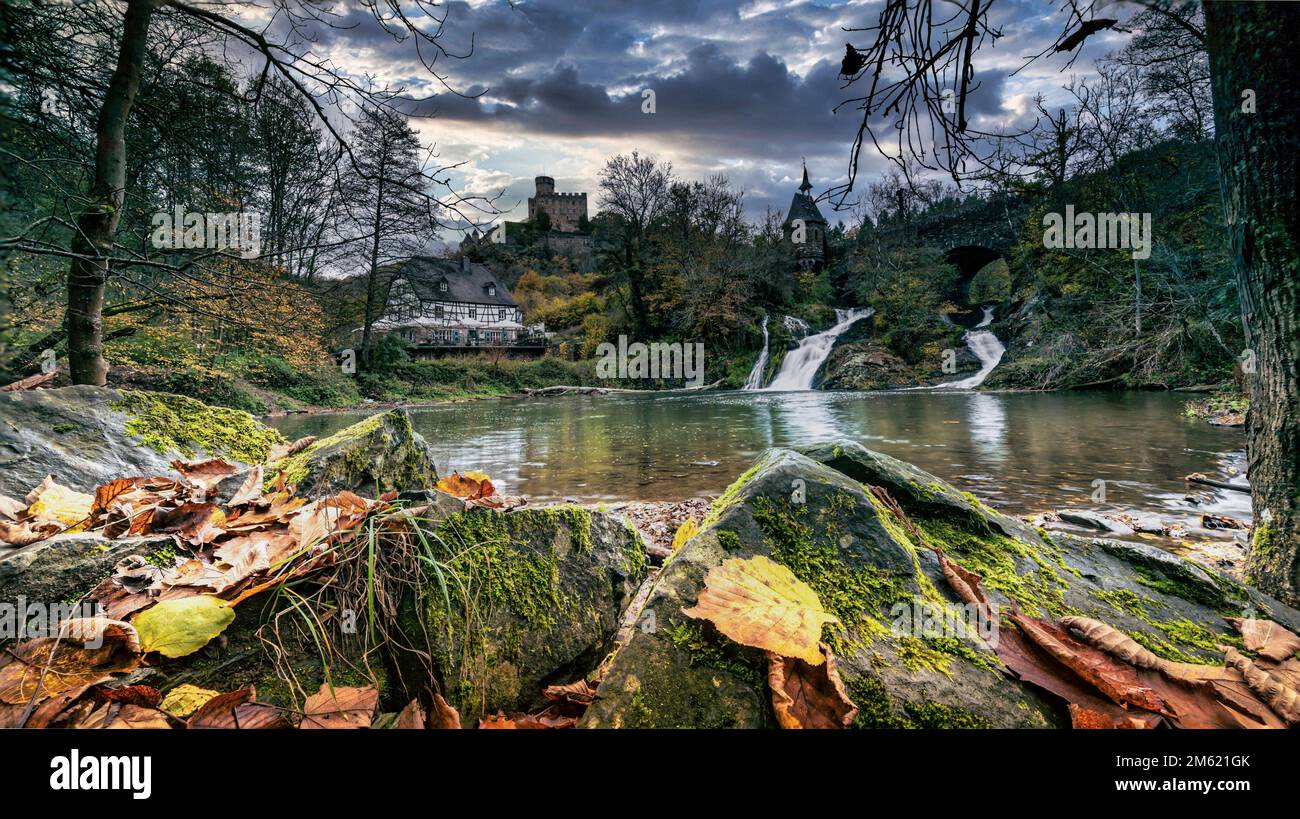 beautiful small waterfall at an old mill below Pyrmont castle Stock ...