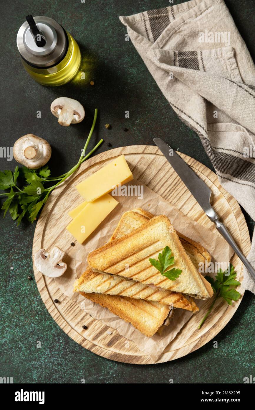 Delicious sandwich with grilled cheese, bacon and mushroom. Homemade ...