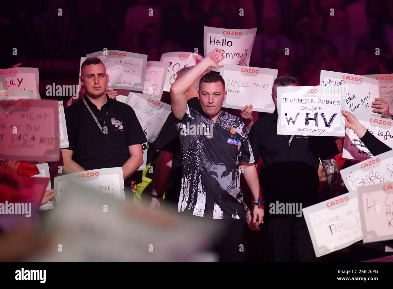 Chris Dobey walks out to play Michael van Gerwen during day fourteen of ...