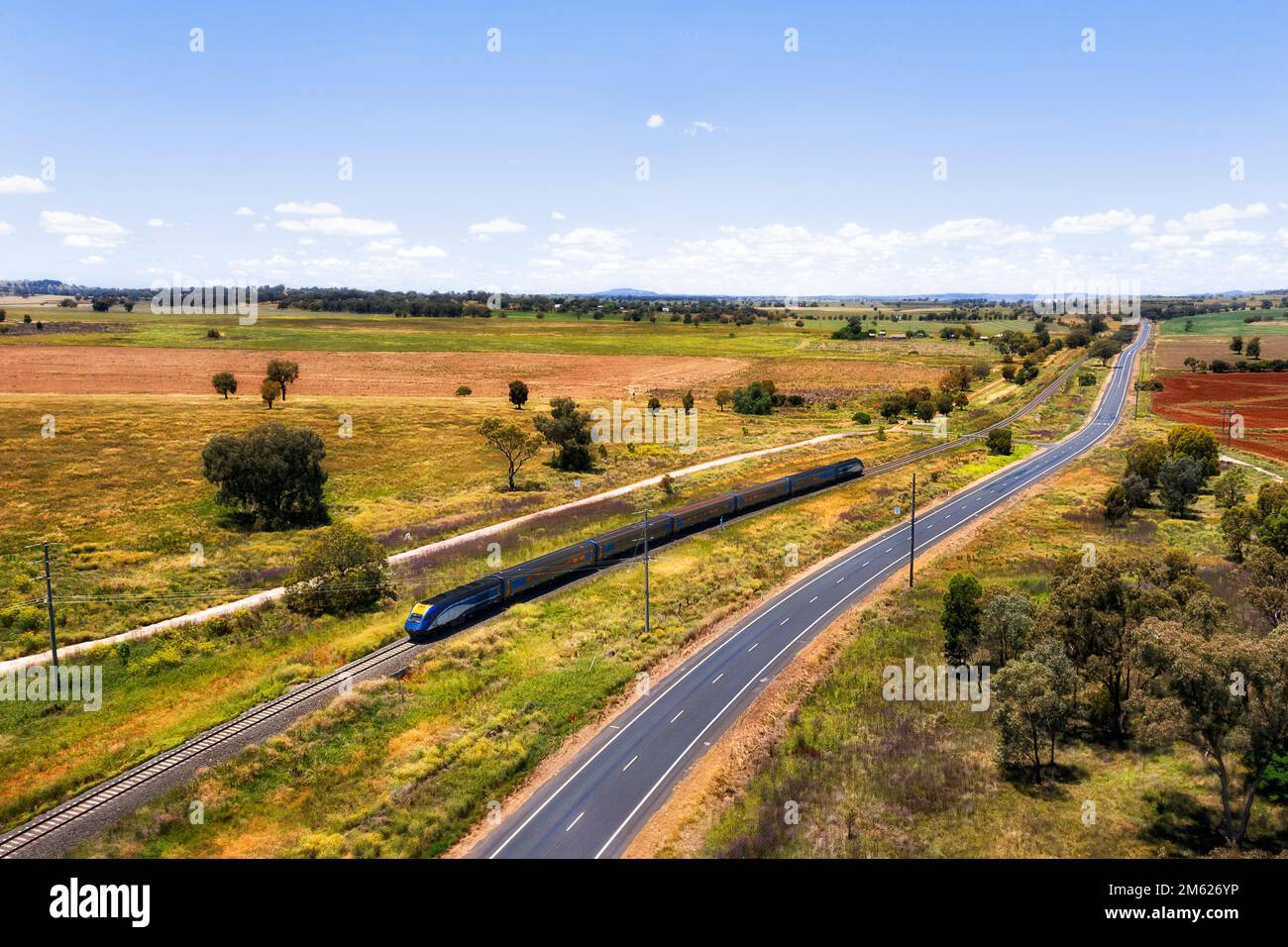 Aerial Train in central west next to whole highway Stock Photo - Alamy