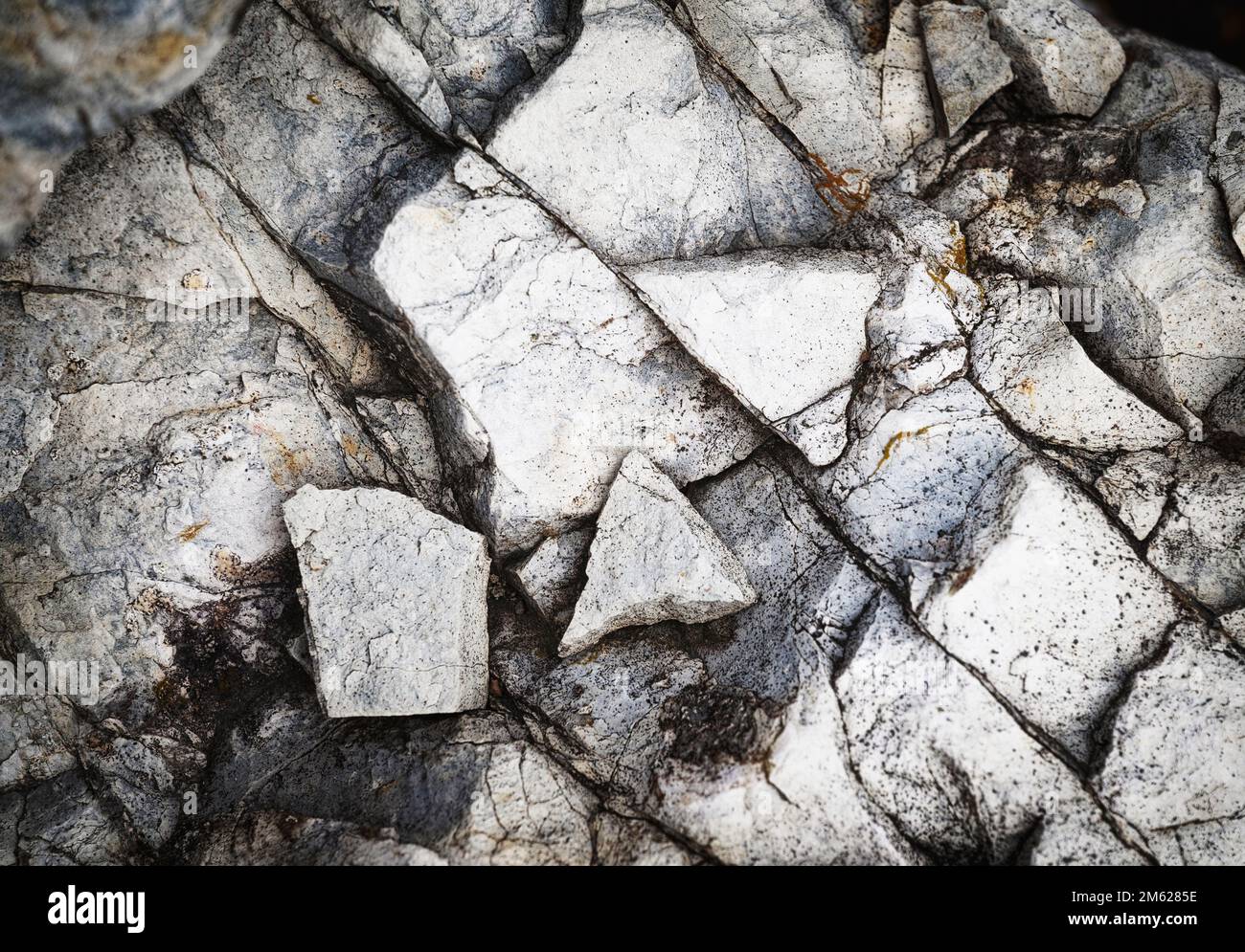 background or texture sharp pebbles on limestone rock Stock Photo - Alamy