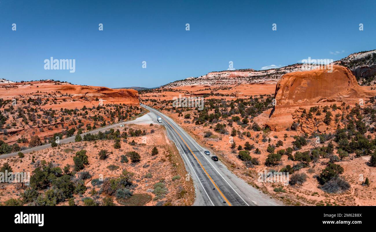 Panoramic image of a lonely, seemingly endless road in the desert of ...