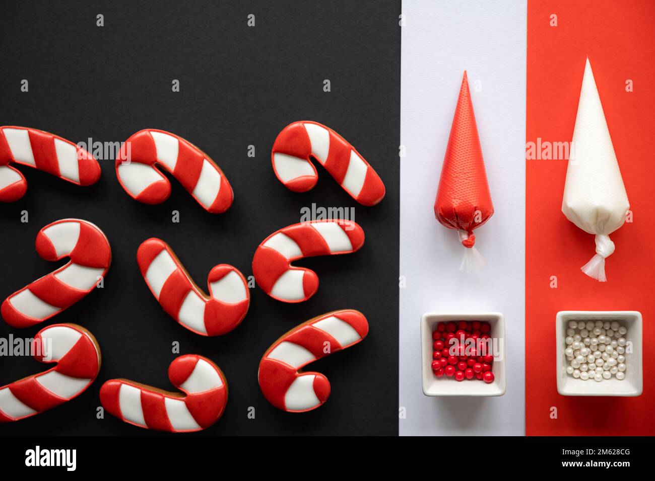 A lot of gingerbread candy cane shaped cookies, flat lay Stock Photo ...