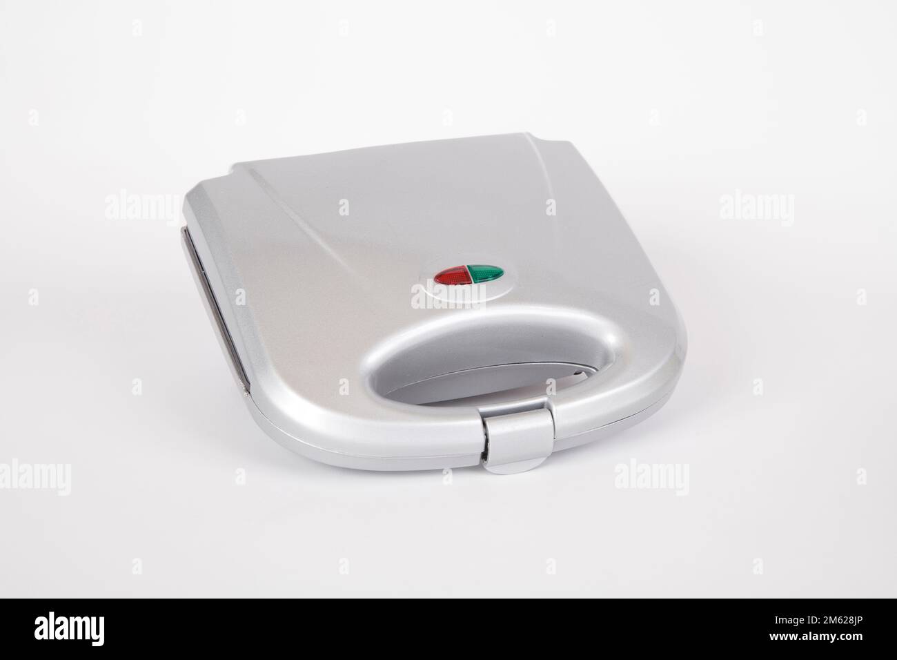 Sandwich maker gray closed; Photo on white background Stock Photo - Alamy
