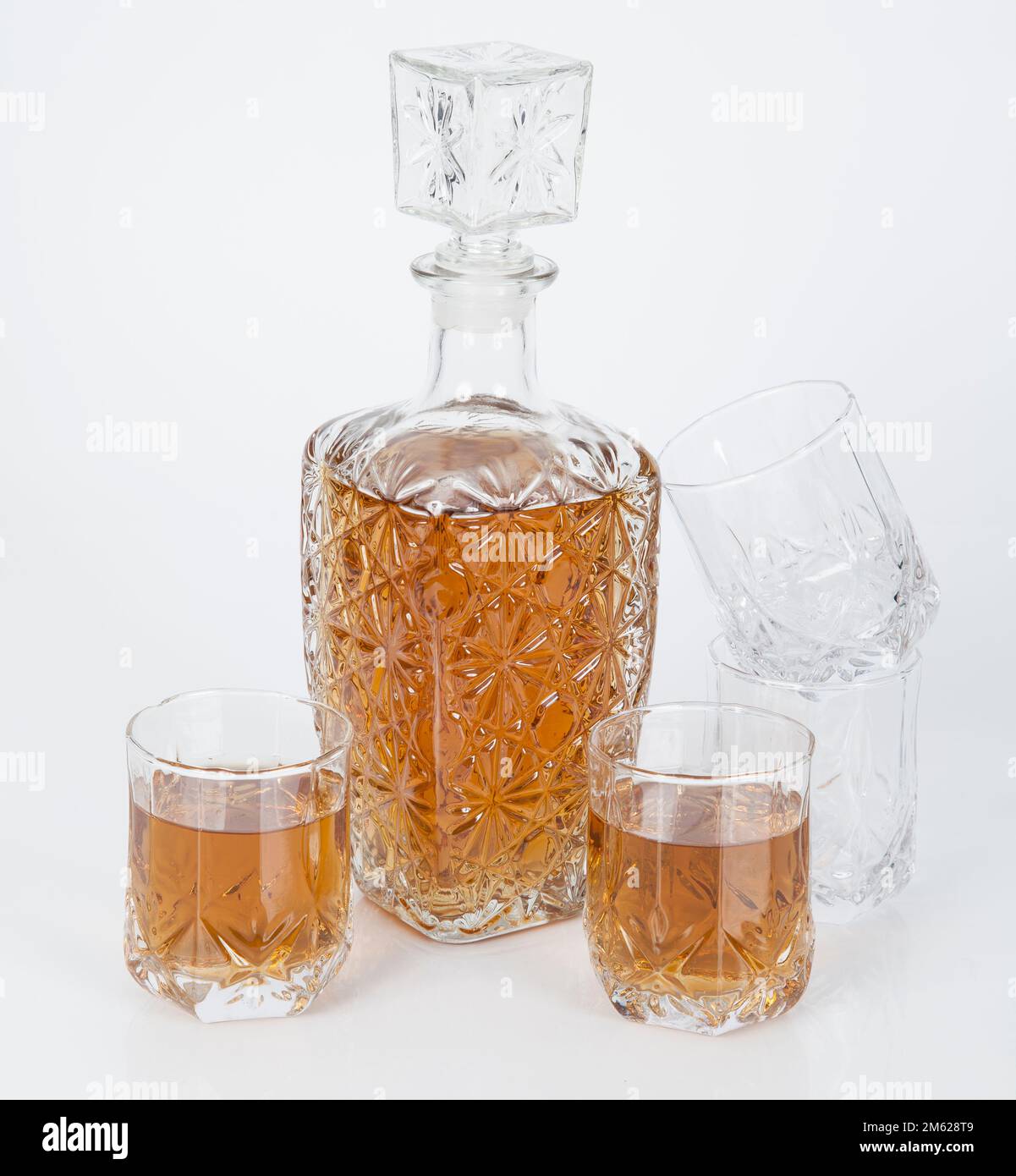 Clear glass decanter with glasses Stock Photo - Alamy