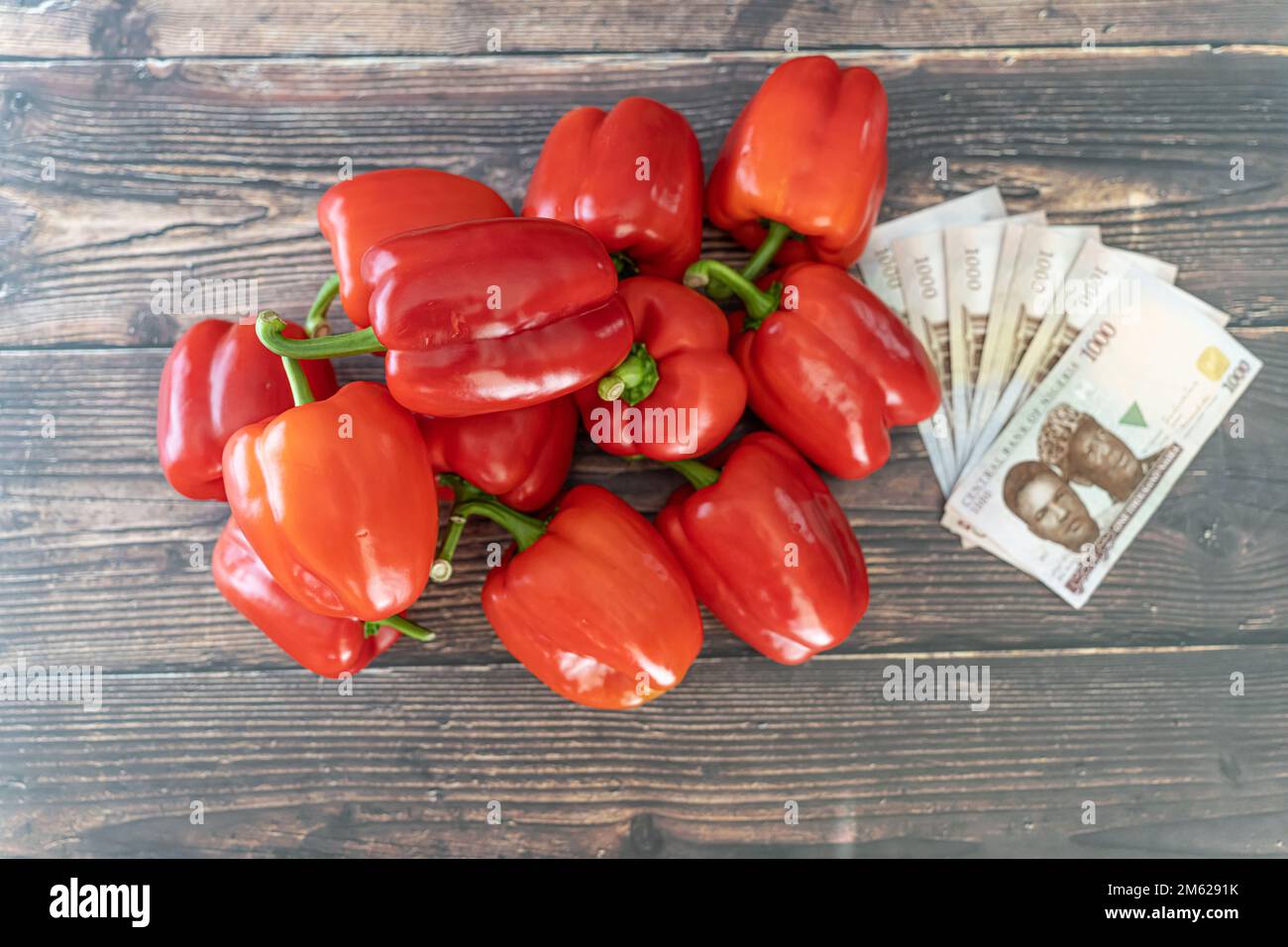 Pile of Bell Peppers with Nigerian Naira Bank Notes Stock Photo - Alamy