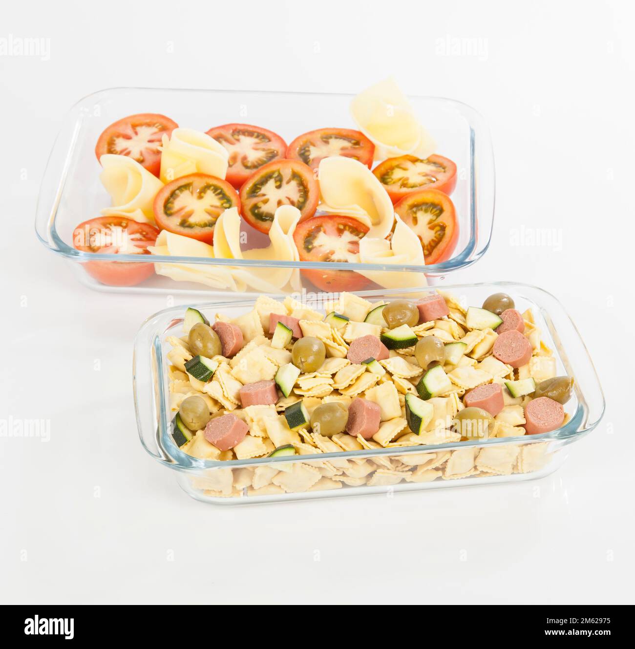 Glass Oven Tray With Food On White Background Stock Photo - Alamy