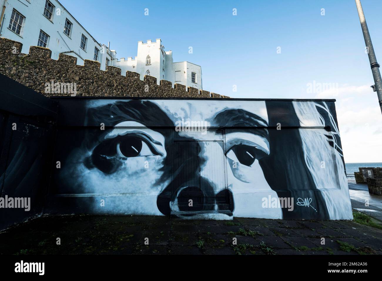 Murals on buildings in Portrush, Northern Ireland Stock Photo - Alamy