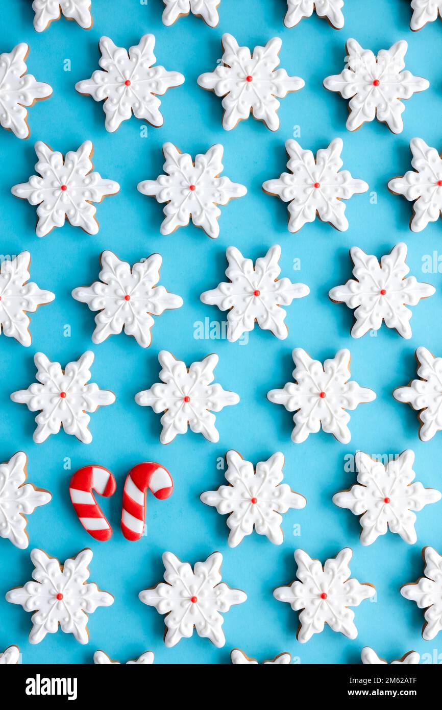 Gingerbread in the form of snowflakes on a blue background Stock Photo ...