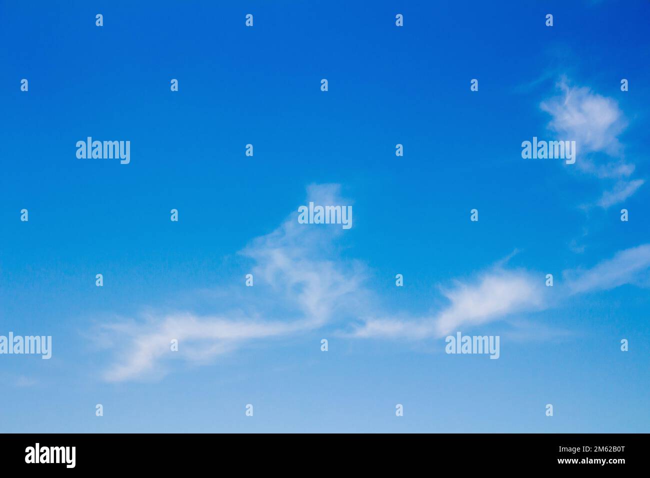 Blue sky with clouds background Stock Photo - Alamy