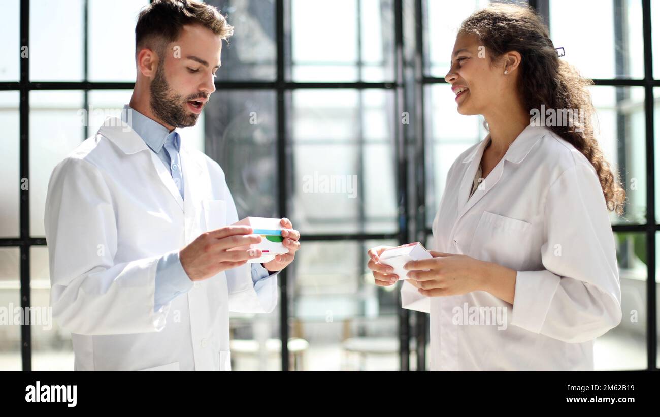 doctor's look at pills in bottle, prescription reading and contents ...