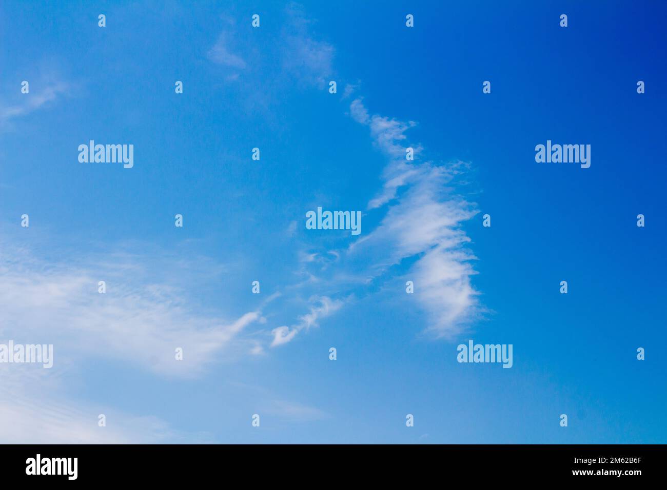 Blue sky with clouds background Stock Photo - Alamy