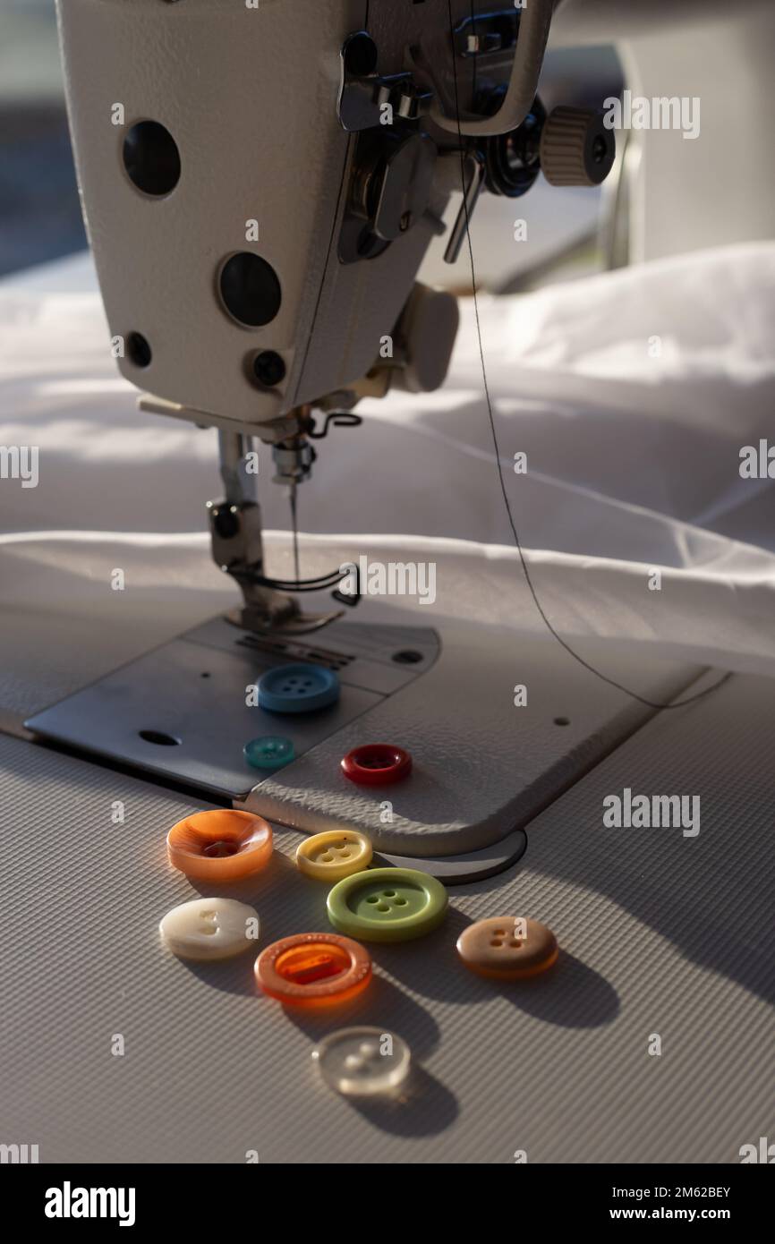 Close up of a industrial sowing machine Stock Photo - Alamy