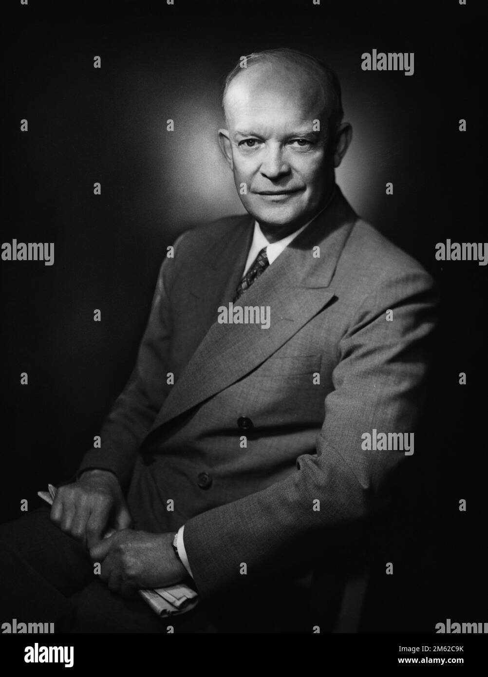 Dwight D. Eisenhower, three-quarter length portrait, seated, facing ...