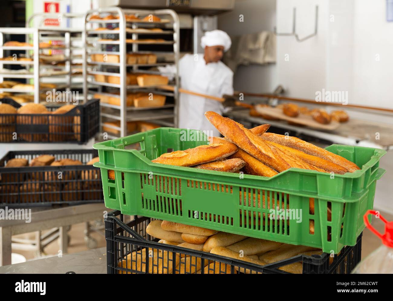 Hot fresh bread in the bakery in box Stock Photo - Alamy