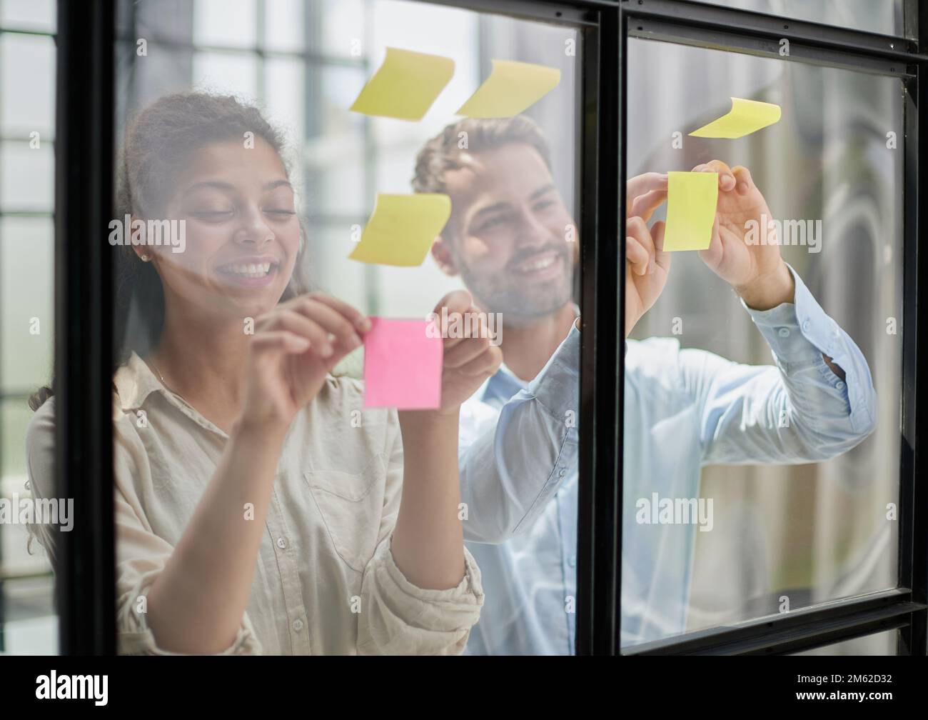 Business team standing behind glass hi-res stock photography and images ...