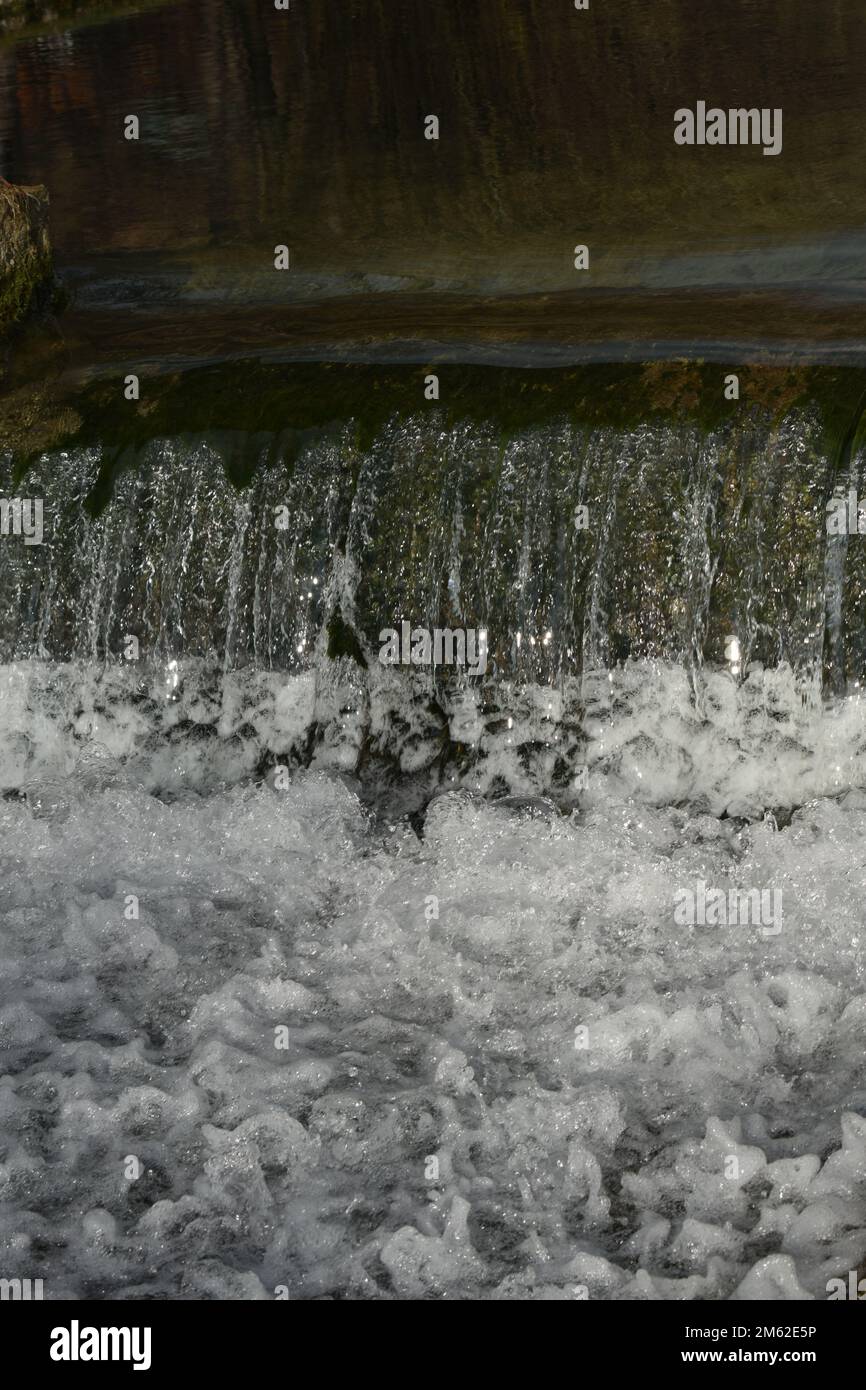 Small dam on a stream Stock Photo - Alamy