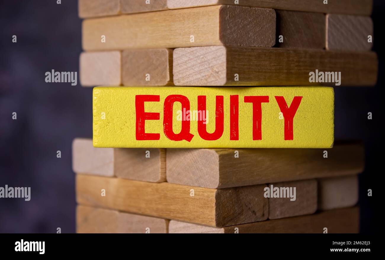 A picture of wooden block with Equity word, house miniature and fake ...