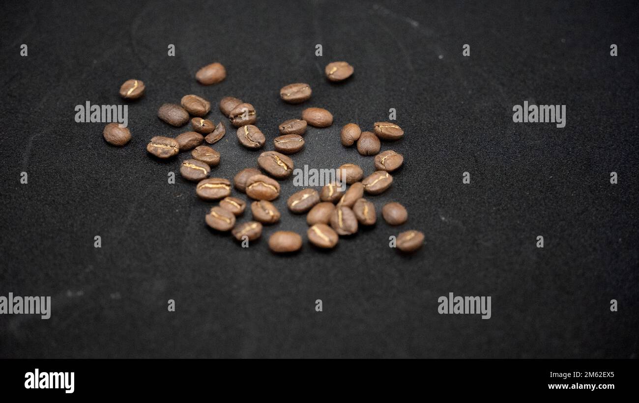 coffee beans in a cup on a black background. Filter coffee, Turkish and ...