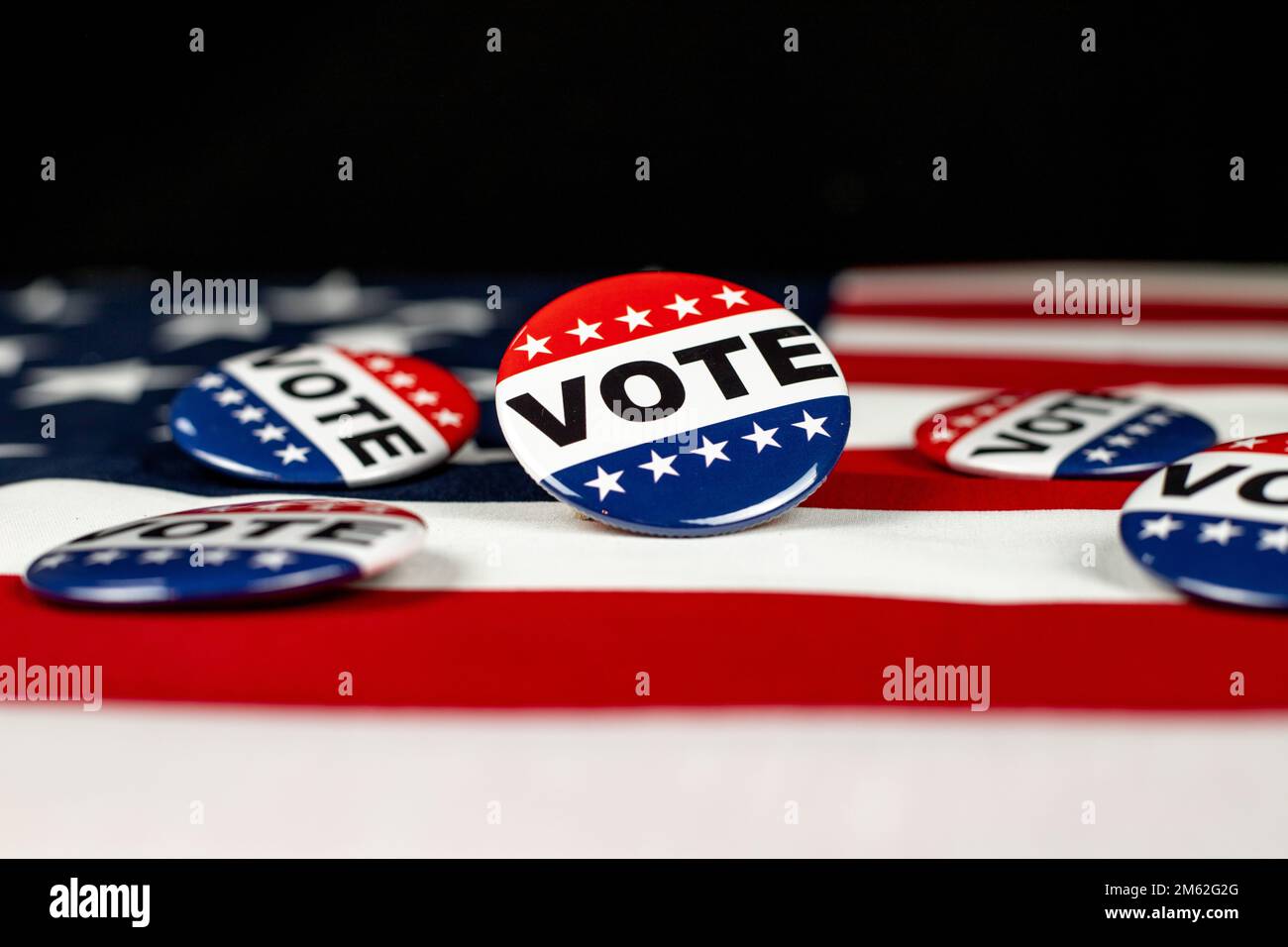 Vote buttons on an American flag with negative space Stock Photo - Alamy