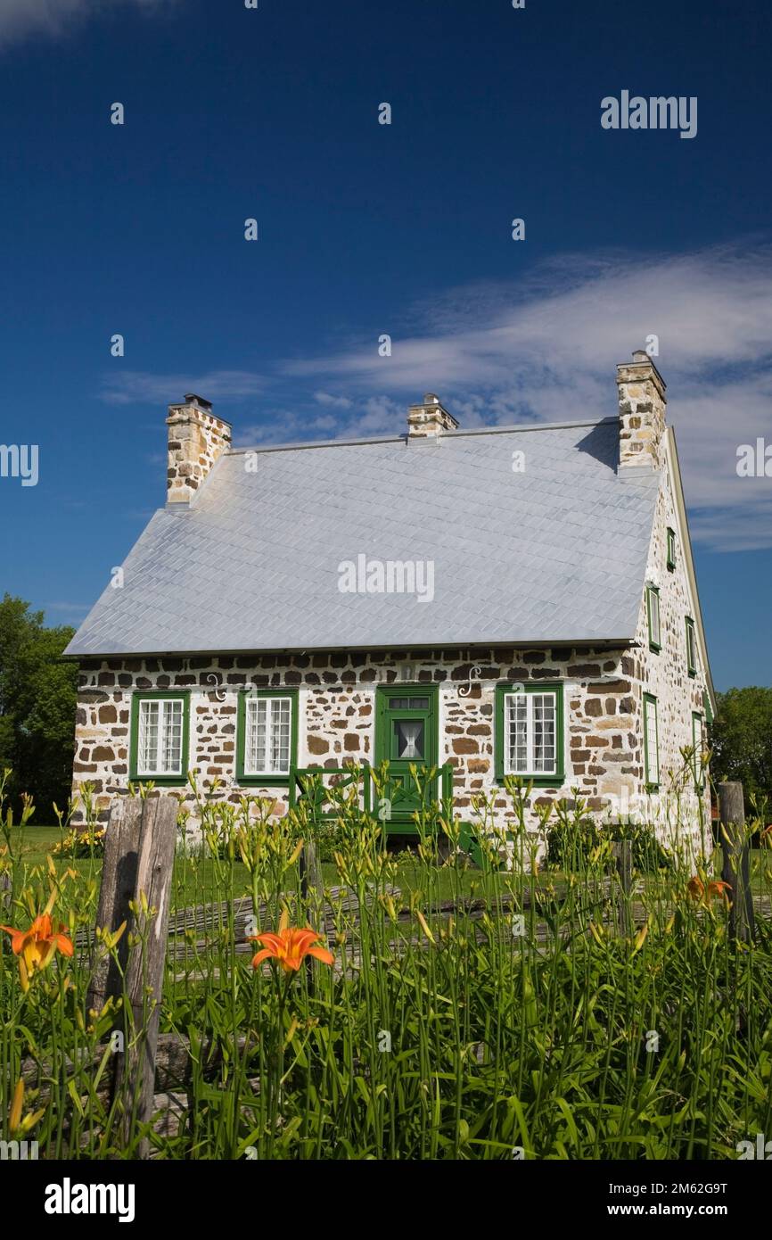 Old 1785 brown, beige and tan fieldstone cottage style home with green ...