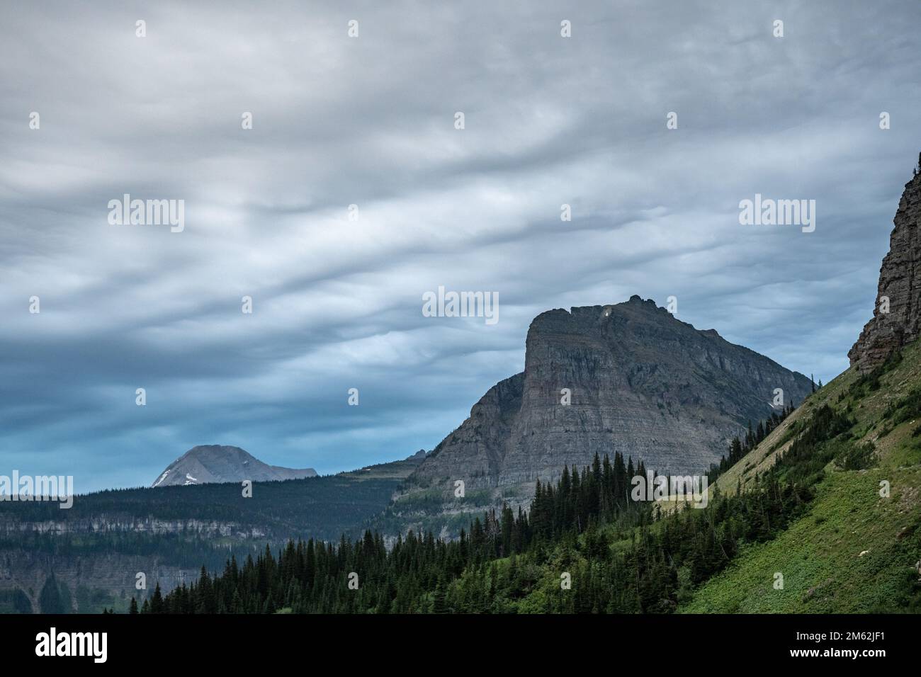 Textured Clouds Hang Over Heavy Runner Mountain in Glacier National ...