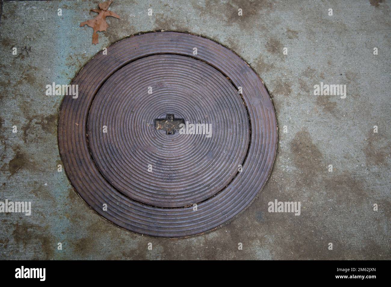 Local, grungy sidewalk of small town with old-fashioned, metallic ...