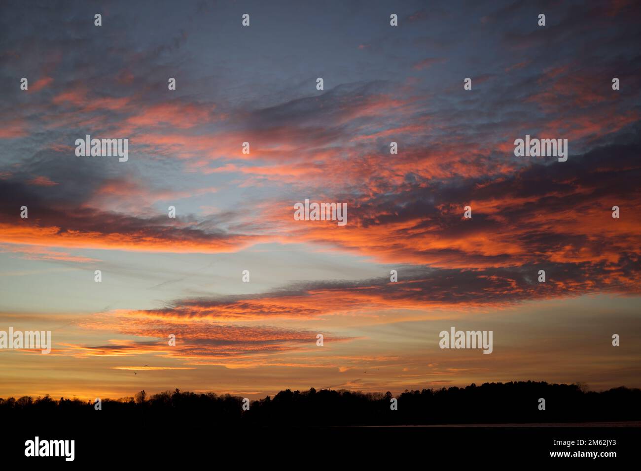 Gorgeous, colorful sunset in Stonington, Connecticut with mostly sky ...