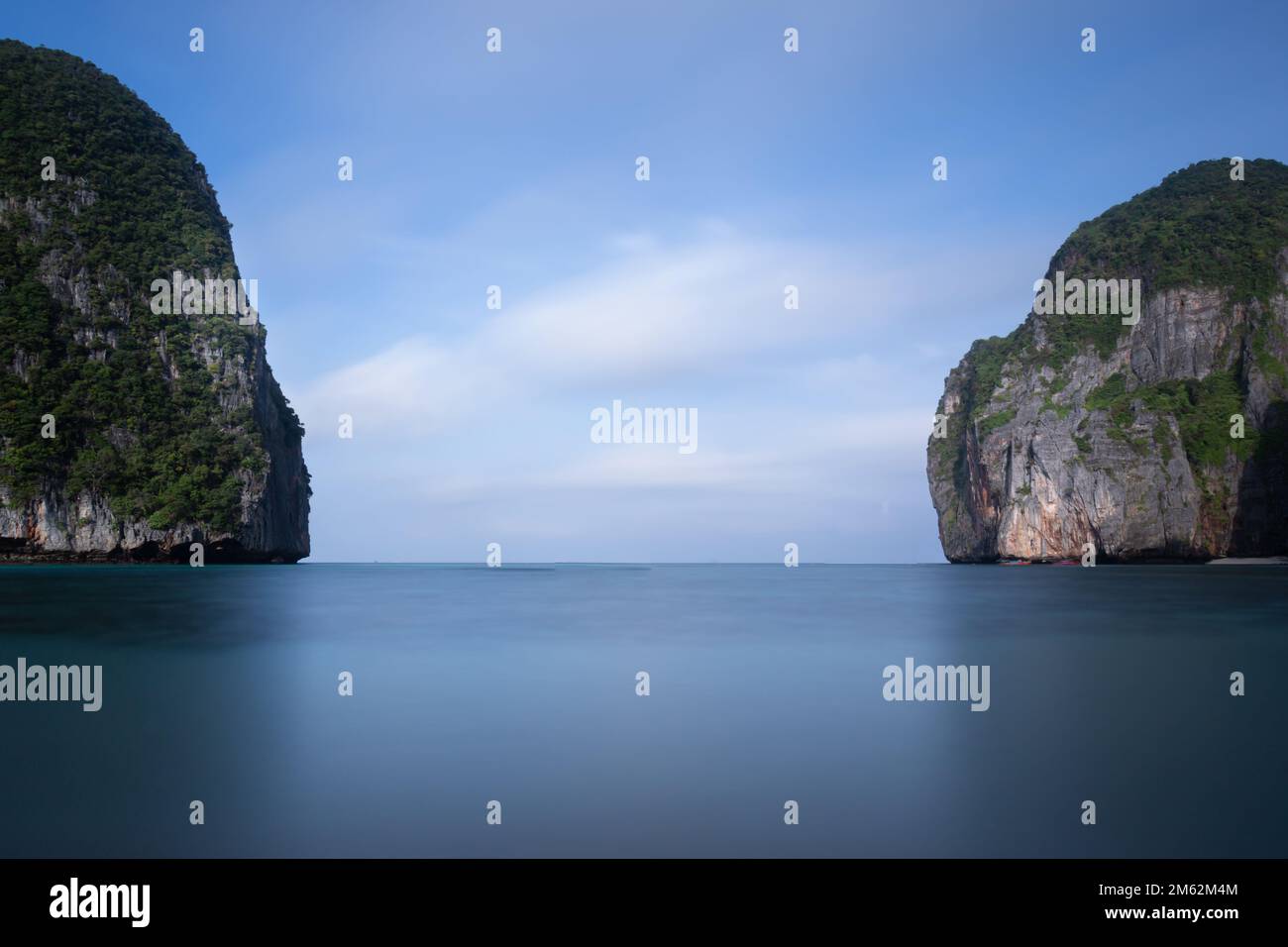 View from Maya Beach looking out to the rocky cliffs. Long exposure ...