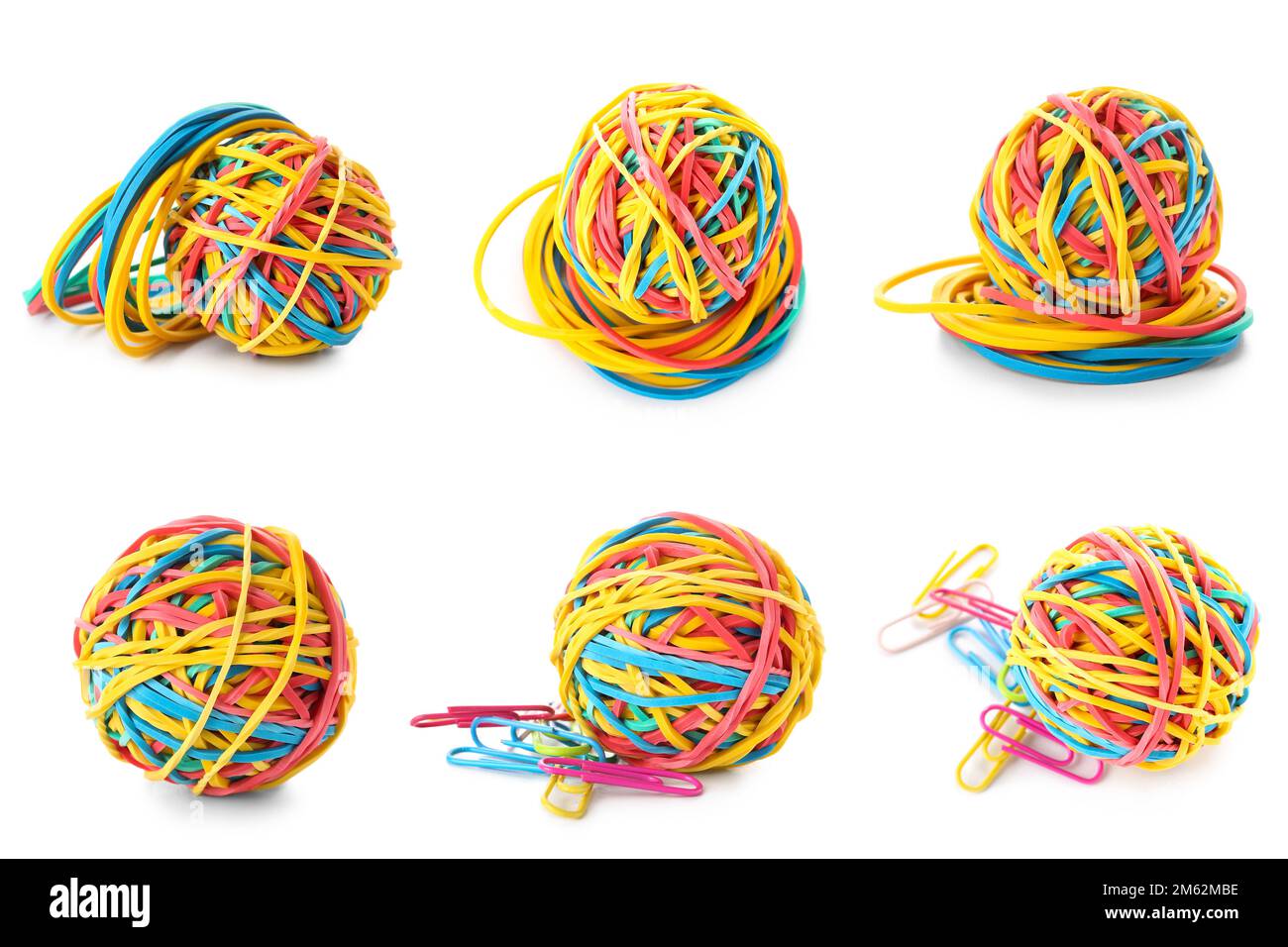 Group of colorful rubber band balls with stationery on white background ...