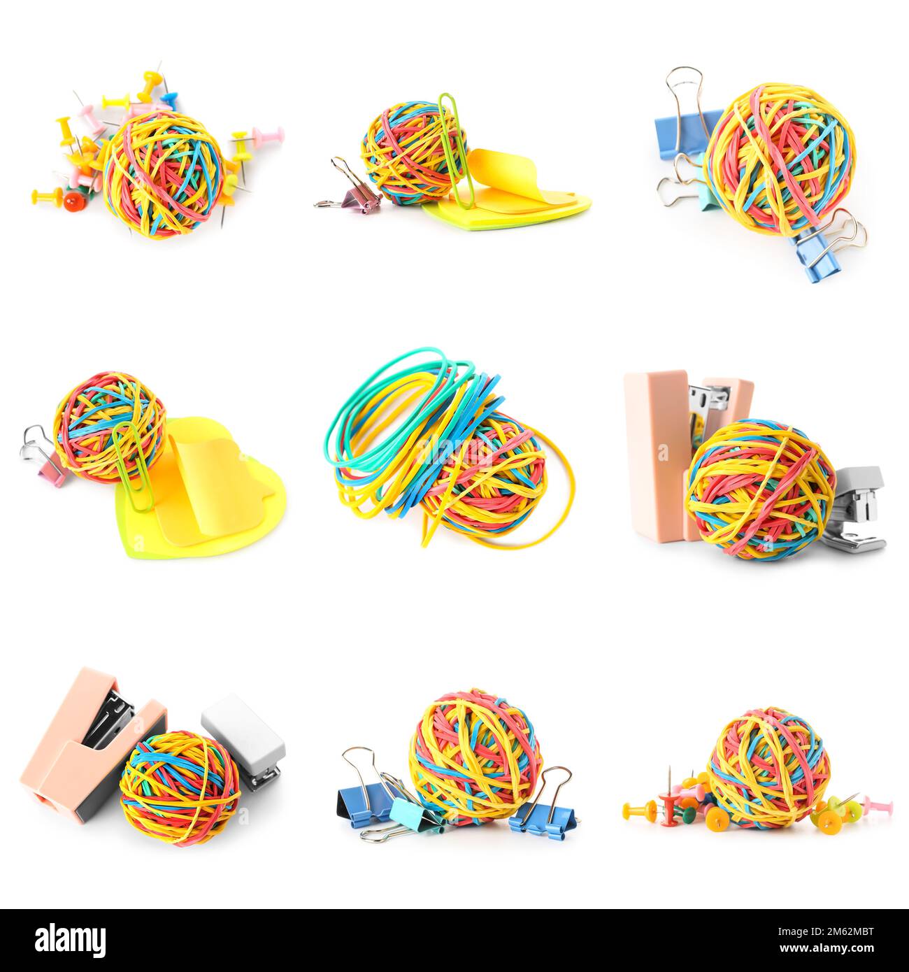 Collection of colorful rubber band balls with stationery on white ...