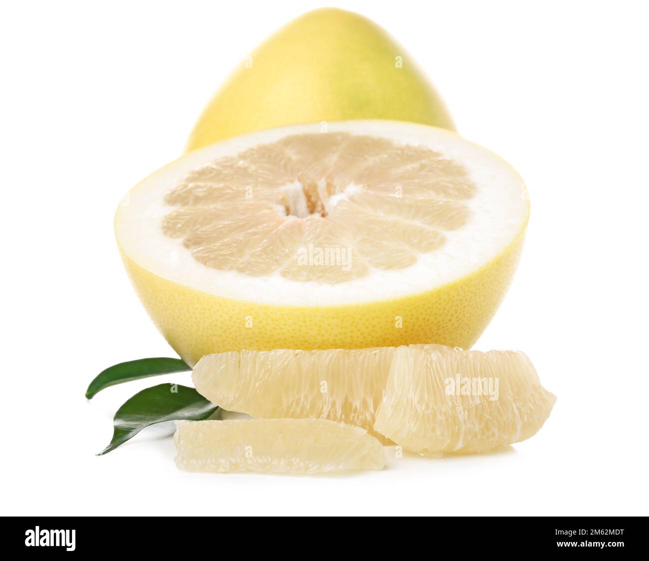 Whole and cut sweet ripe pomelo fruits with slices on white background ...