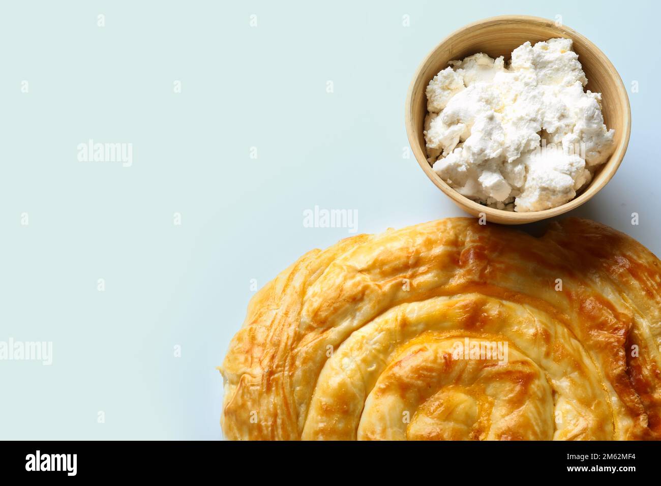 Delicious cheese pie on blue background Stock Photo - Alamy