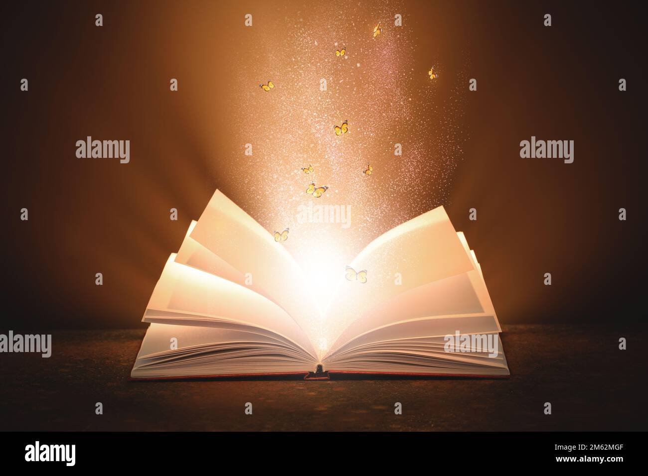 Open magic book with glow and flying butterflies on dark background ...