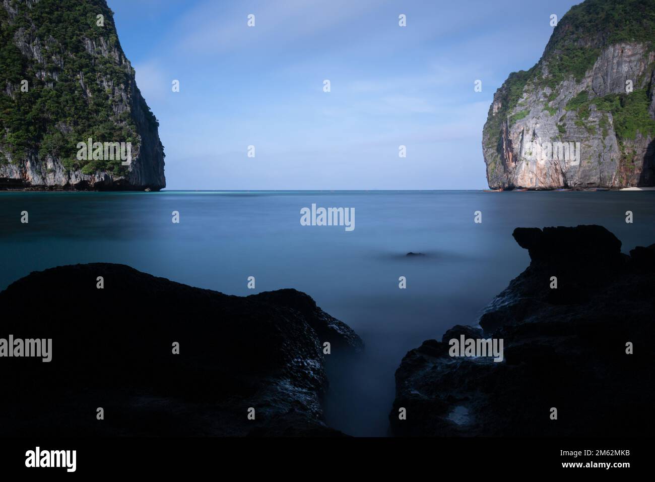 View from Maya Beach looking out to the rocky cliffs. Long exposure ...