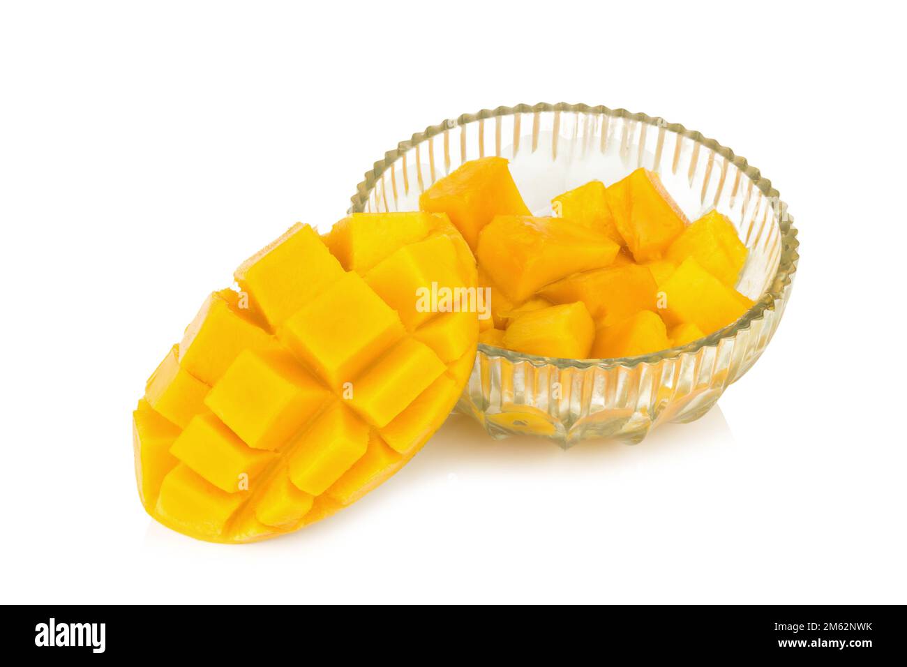 yellow mango. slice. cube. cube mango in glass. isolated on white ...