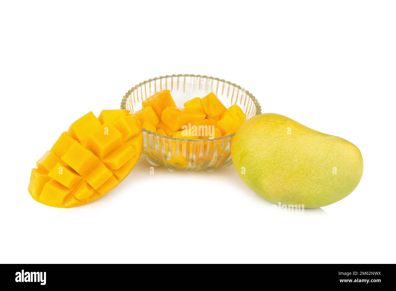 yellow mango. slice. cube. cube mango in glass. isolated on white ...