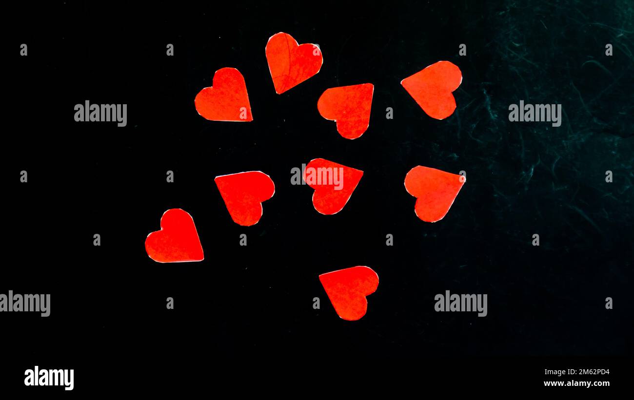 red heart on black background for valentine's day Stock Photo - Alamy