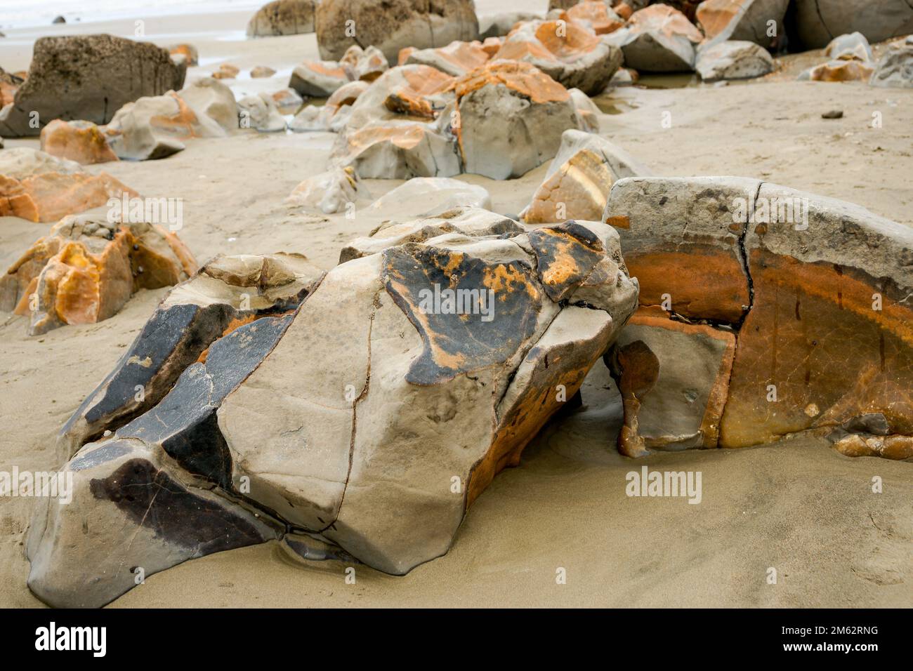 Unusual round rocks on beach hi-res stock photography and images - Alamy
