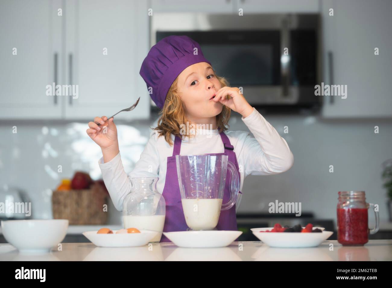 Chef child cooking healthy meal and dinner preparation. Kid chef cook ...