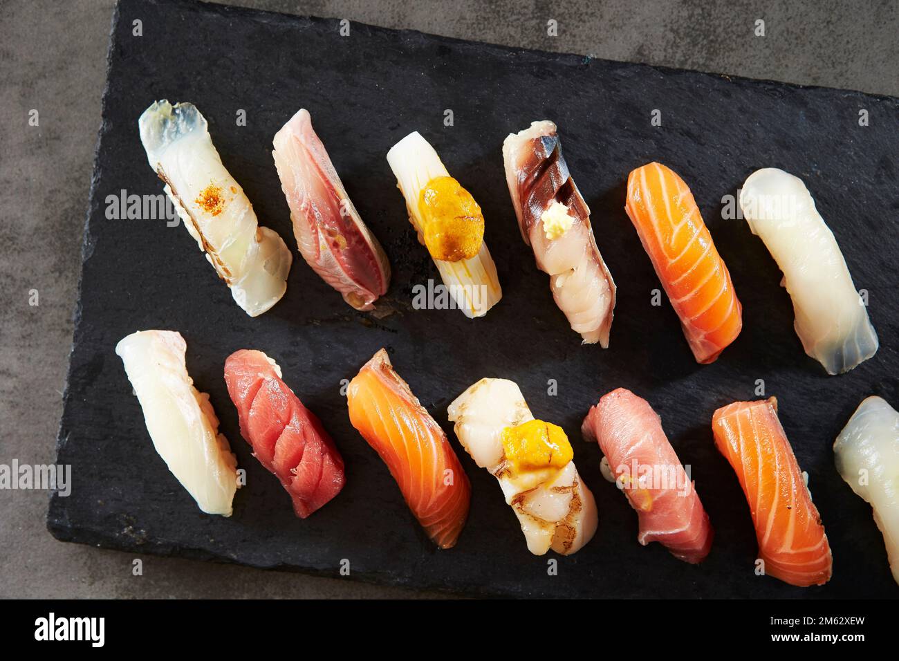 Different types of sushi on a plate Stock Photo - Alamy