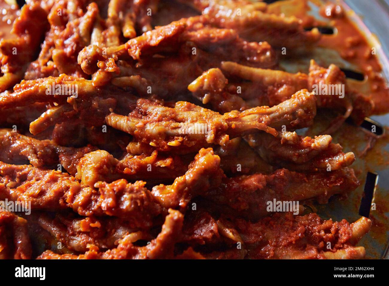 Hot and Spicy Chicken Feet Stock Photo - Alamy