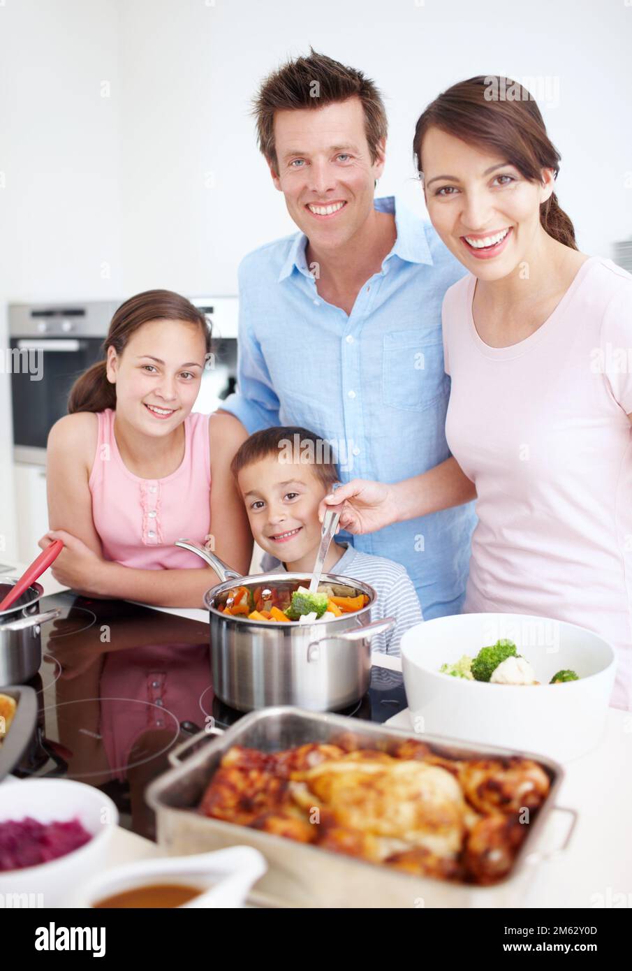 Each doing their part to make an awesome meal. Portrait of a delighted ...