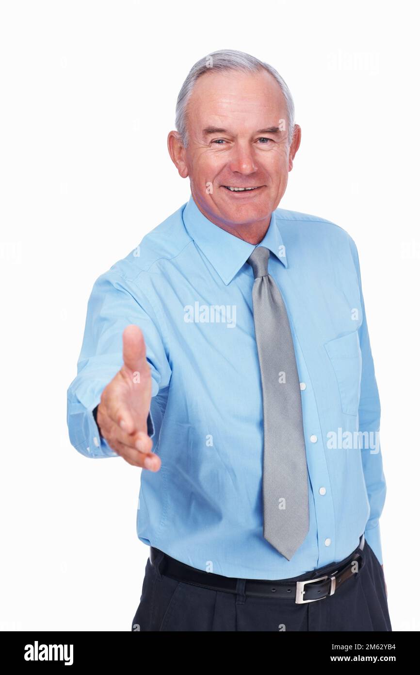 Happy business man extending handshake. Portrait of happy mature ...