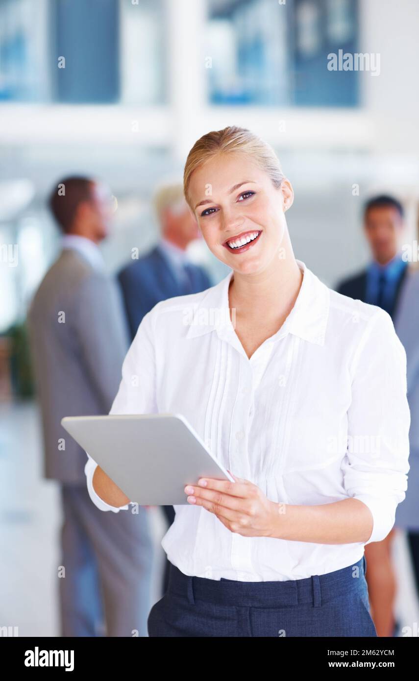 Successful business woman using electronic tablet. Portrait of ...