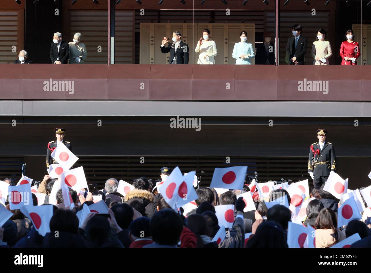 Tokyo, Japan. 2nd Jan, 2023. Wellwishers wave Japan's national flags as ...