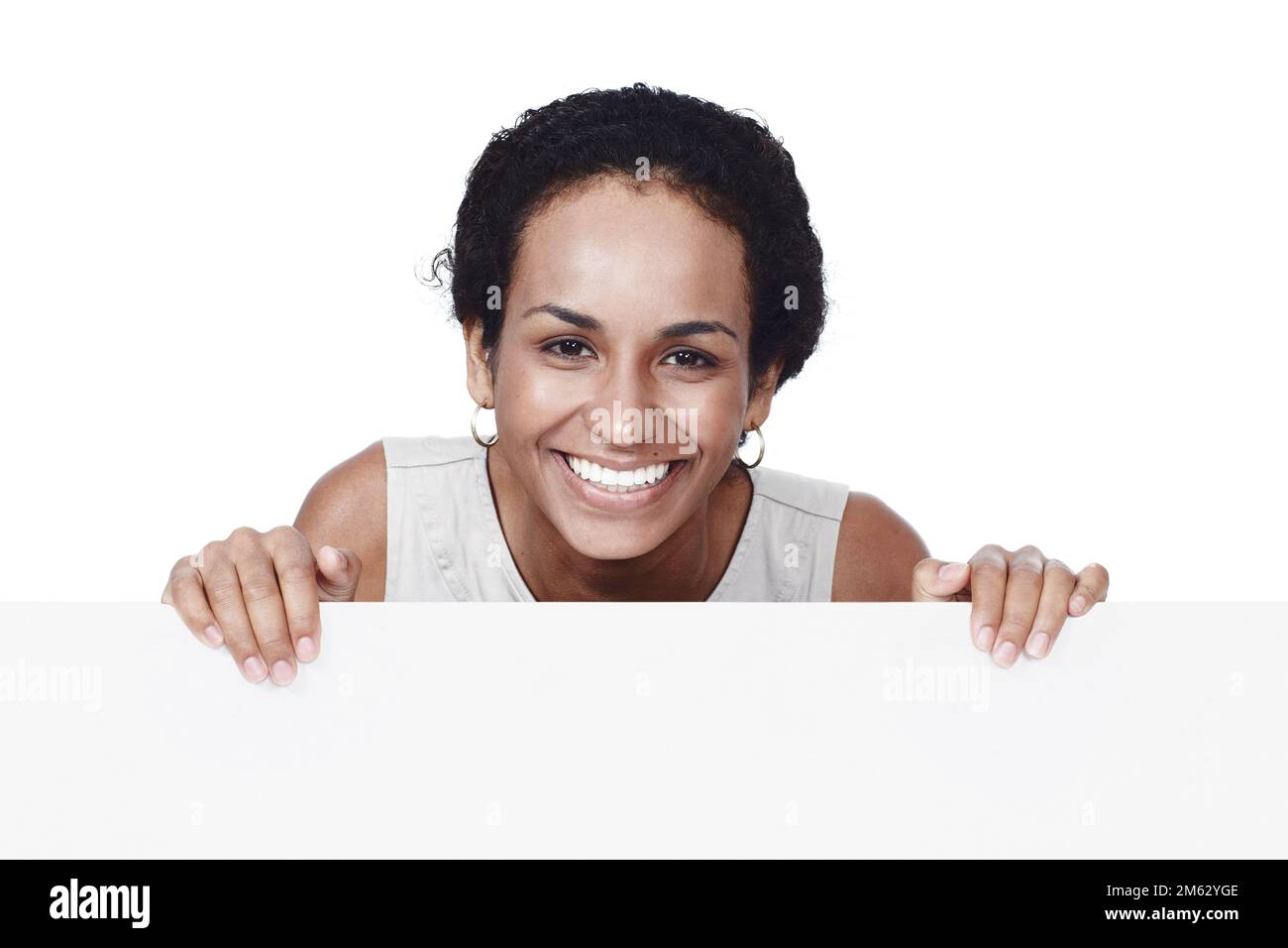 Shes got a winning smile. Studio shot of a confident woman posing ...