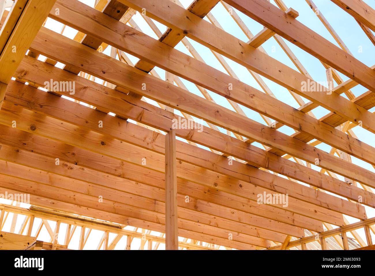 Construction of a new house. View of the wooden roof structure Stock ...